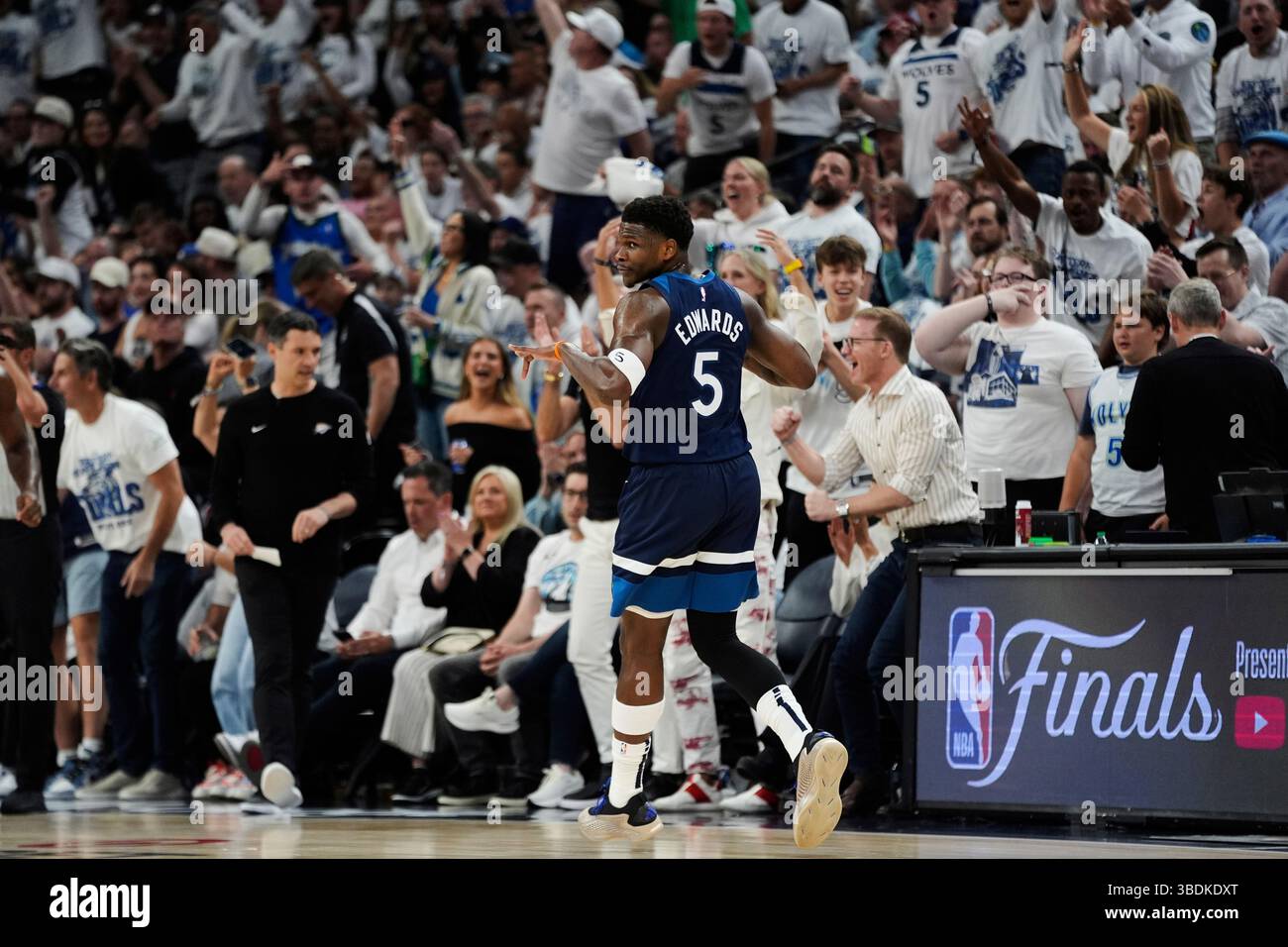 Minnesota Timberwolves guard Anthony Edwards (5) reacts after making a ...