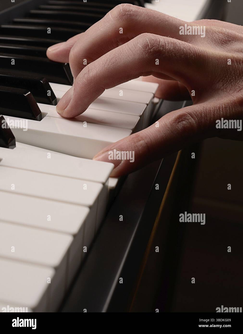 Detail of playing piano Stock Photo - Alamy