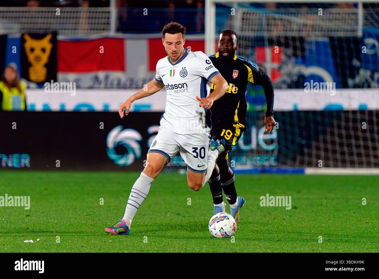 Como, Italy. 24th May, 2025. Carlos Augusto of FC Inter and Jonathan ...