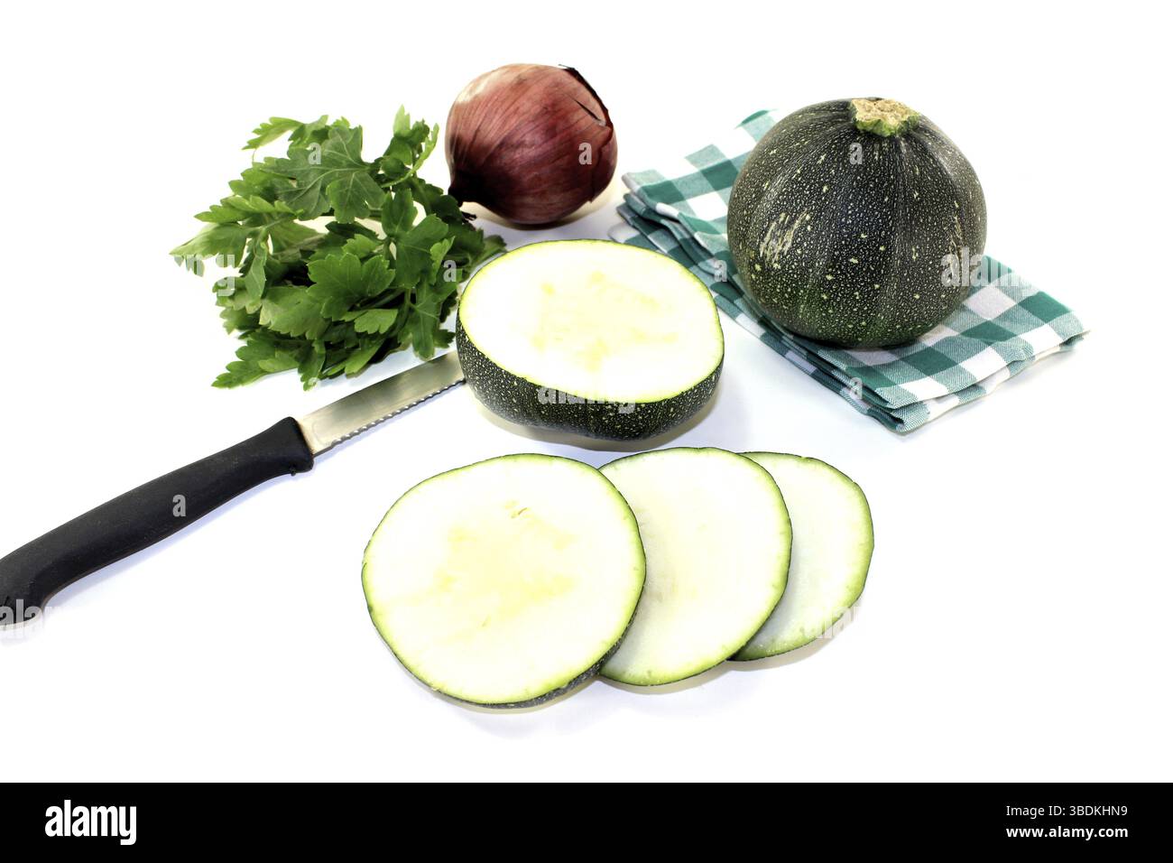 Round raw courgette onion Cut Out Stock Images & Pictures - Alamy