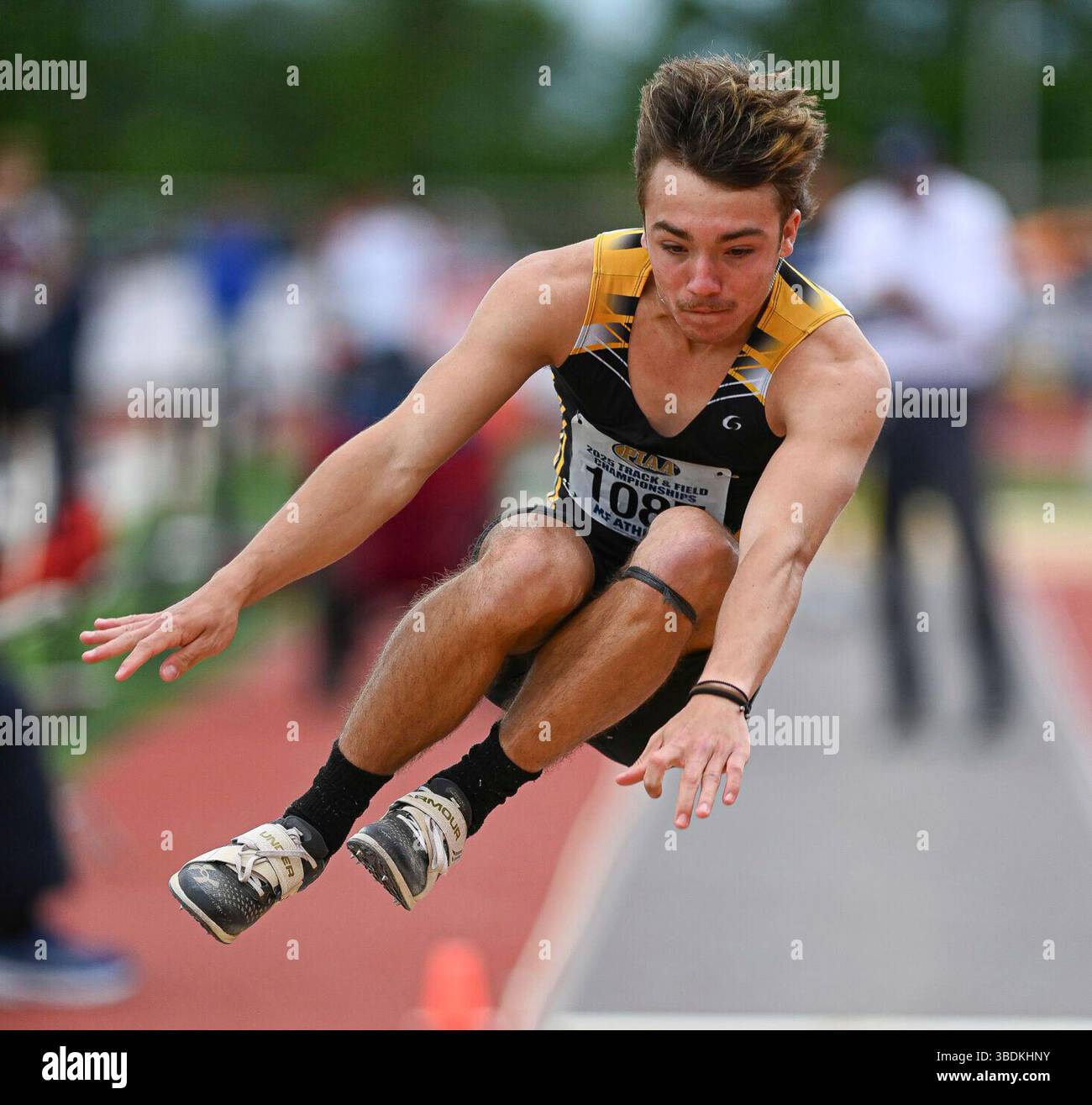 Northern Cambria's Daniel Farrell prepares for landing in the class 2A ...