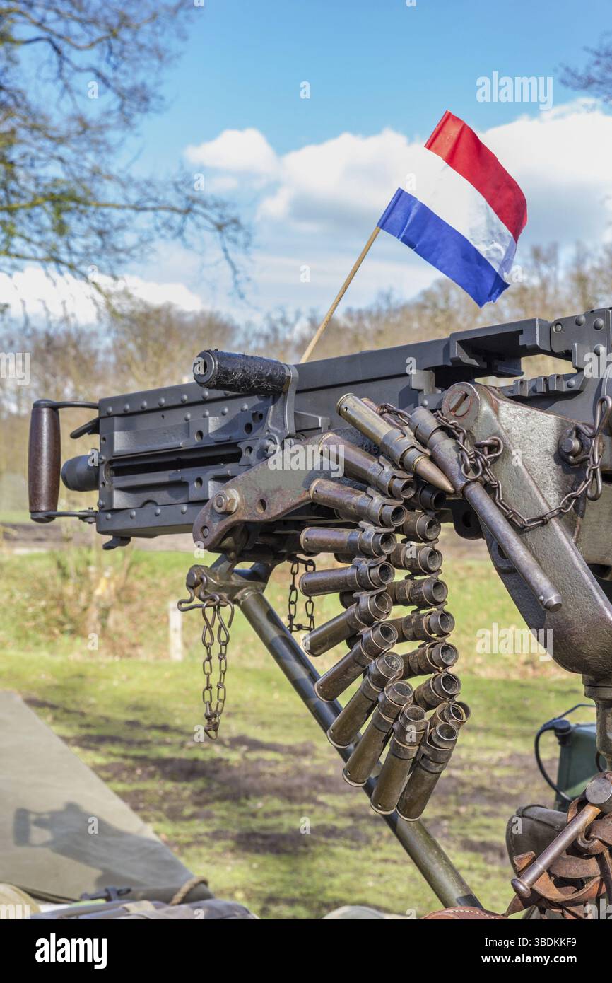Military machine gun with bullets and dutch flag Stock Photo - Alamy