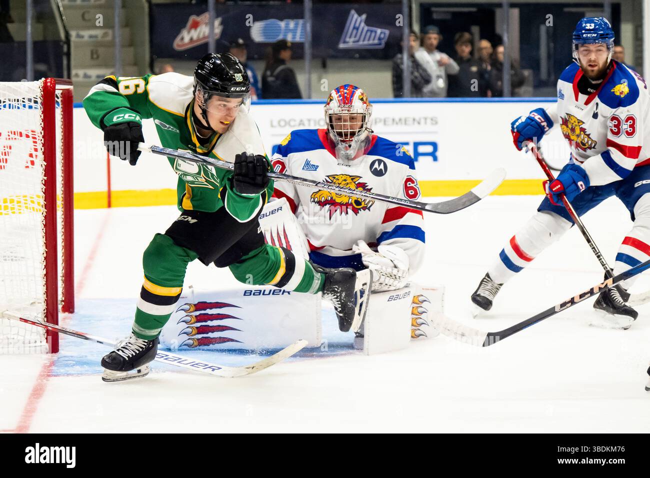Moncton Wildcats goaltender Mathis Rousseau (60) defends against London ...