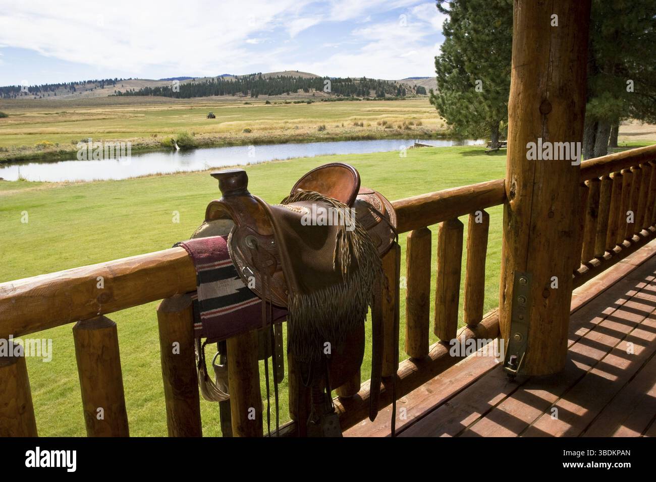 Saddle on parapet, Ponderosa Ranch, Oregon, Wild West, USA, North ...