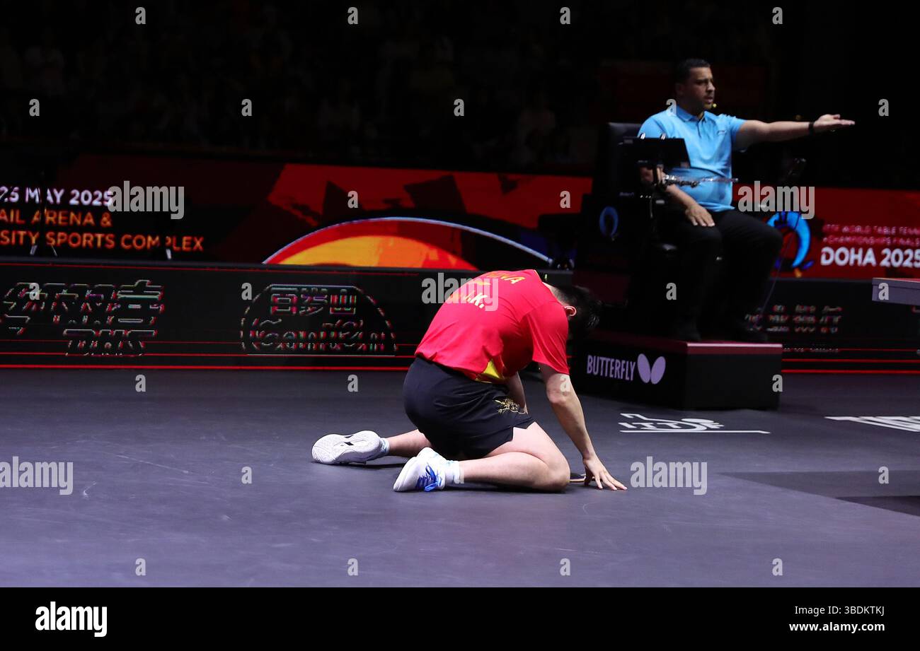 Doha, Qatar. 24th May, 2025. Liang Jingkun reacts after losing the men ...