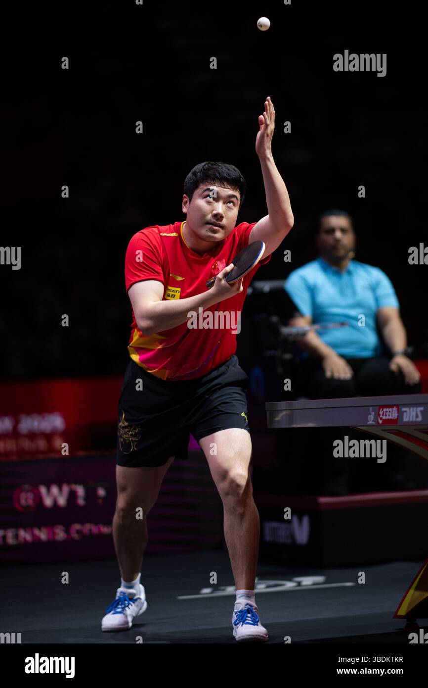 Doha, Qatar. 24th May, 2025. Liang Jingkun serves during the men's ...