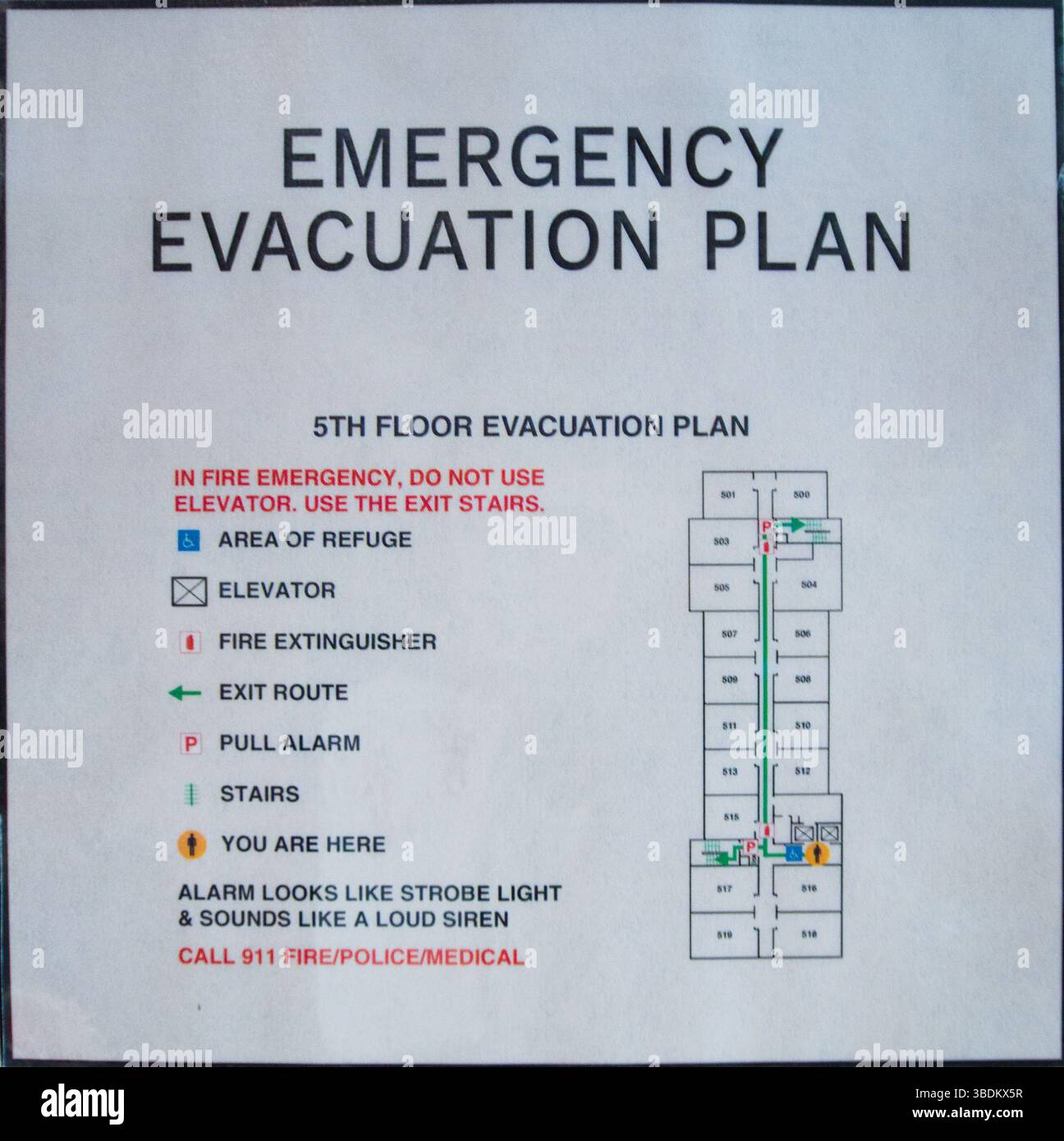 Generic school or hotel office building evacuation plan signage. High ...