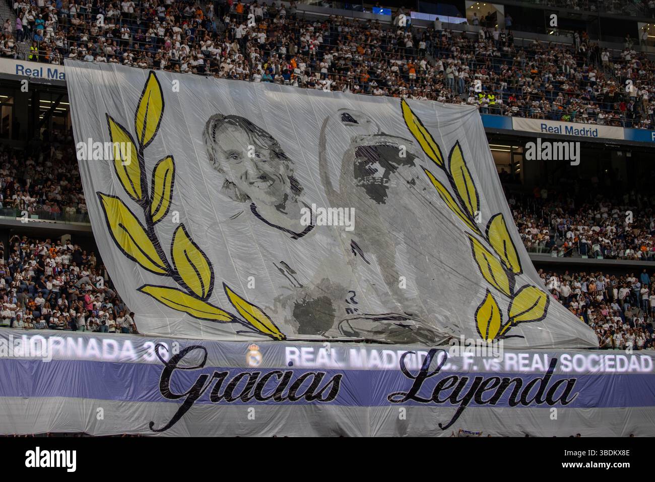 Madrid, Spain. 24th May, 2025. A banner with the face of Real Madrid's ...