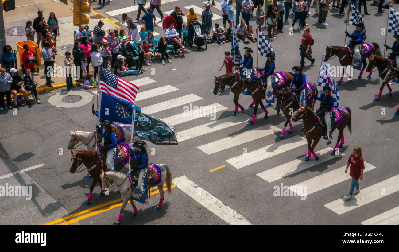 Indianapolis, USA. 24th May, 2025. Crowds of spectators watching the ...
