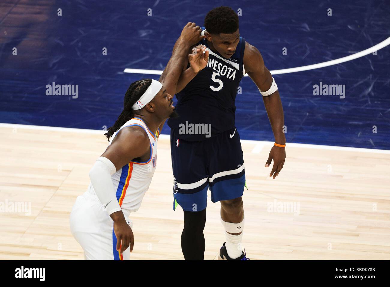 Oklahoma City Thunder guard Luguentz Dort, left, defends against ...