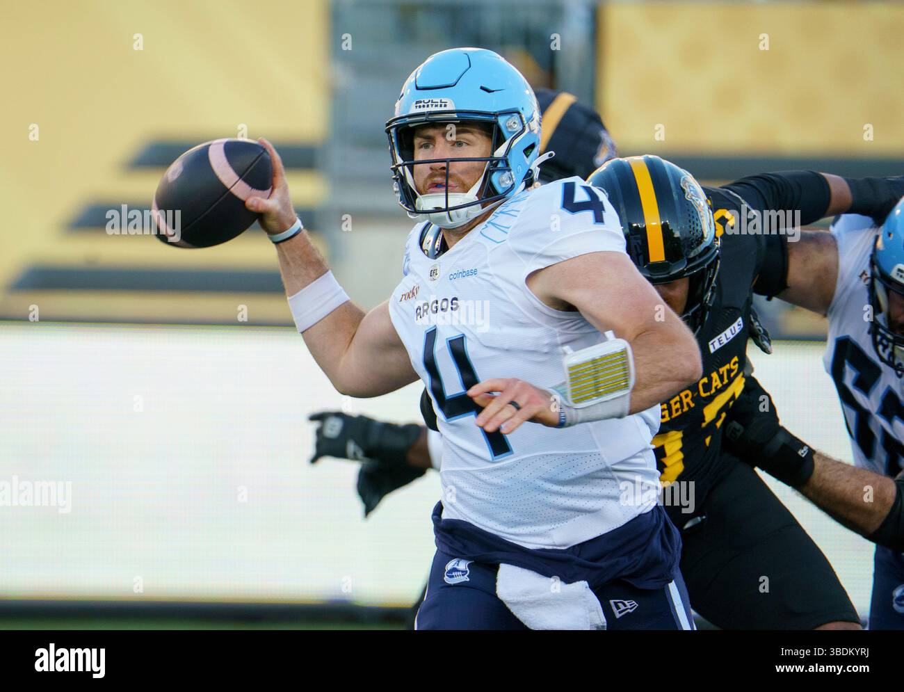 Toronto Argonauts quarterback Nick Arbuckle (4) scrambles to throw ...