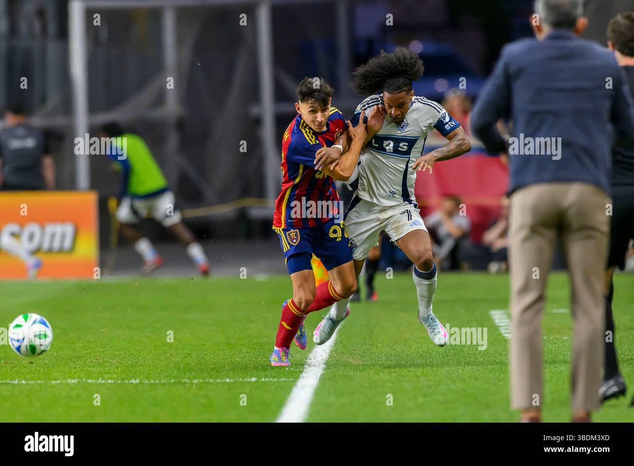 Real Salt Lake midfielder Noel Caliskan (92) pushes Vancouver Whitecaps ...