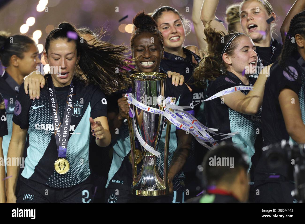 Players of U.S. NJ/NY Gotham FC with the trophy celebrate after winning ...