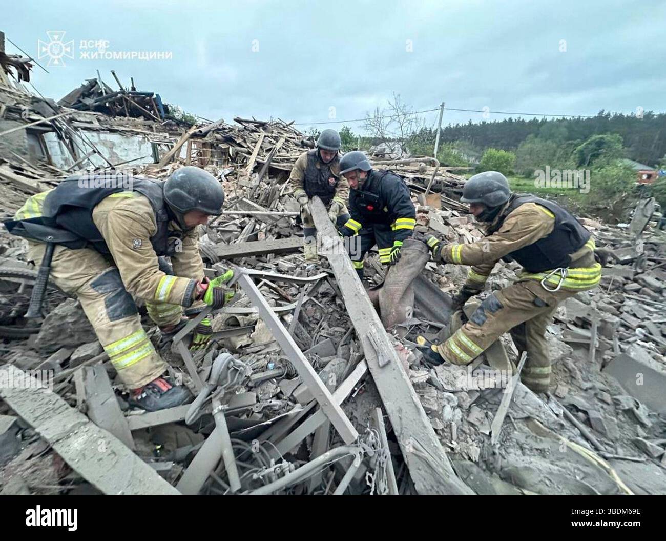 In this photo provided by the Ukrainian Emergency Service, firefighters ...