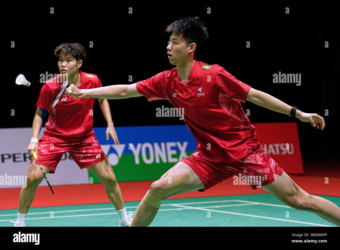 China's Feng Yan Zhe, front and Huang Dong Ping play against ...