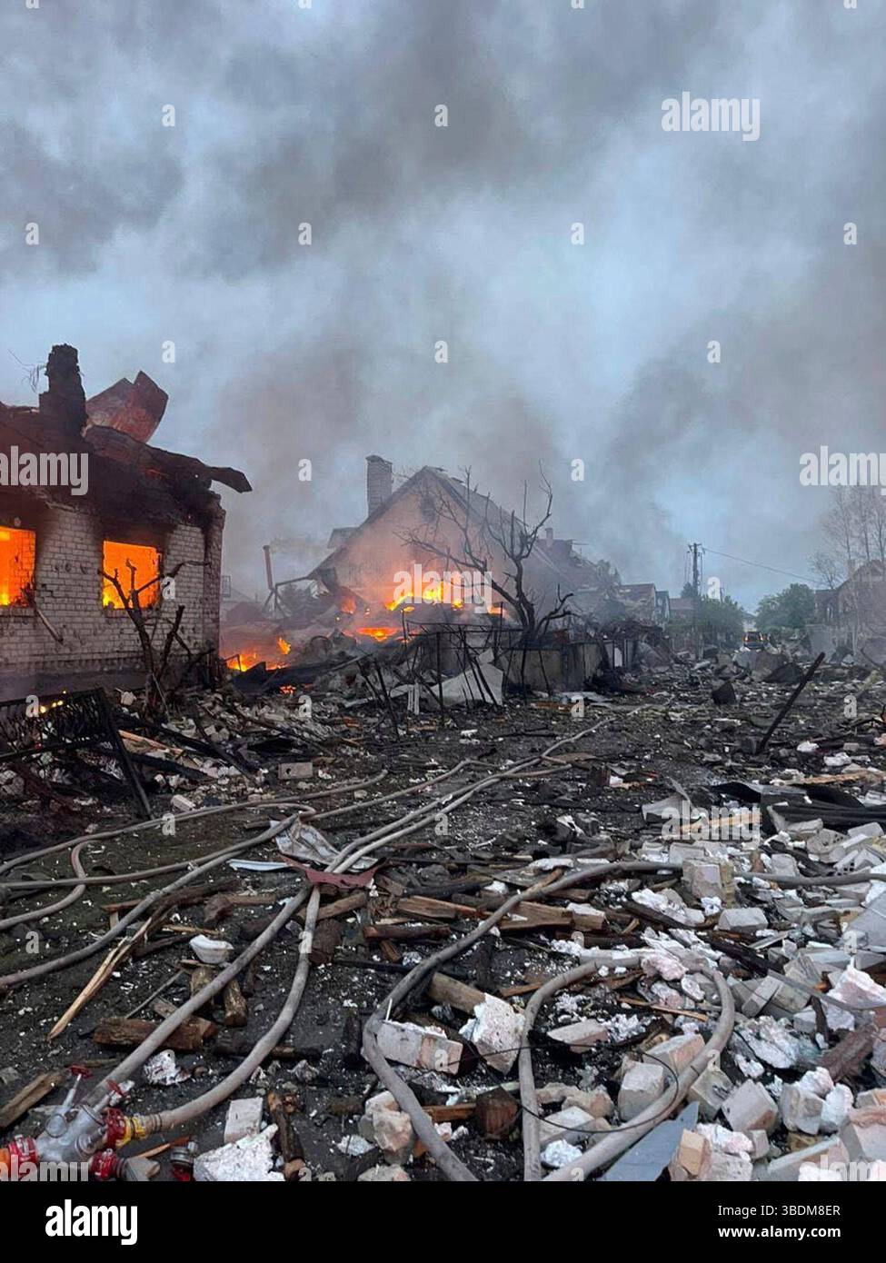 In this photo provided by the Ukrainian Emergency Service, buildings ...