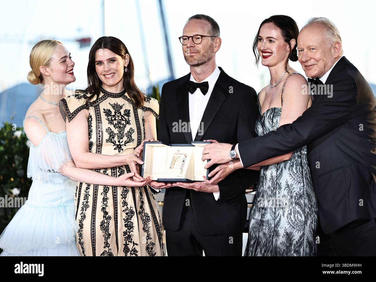 Cannes, France. 24th May, 2025. Norwegian director Joachim Trier (C) poses with cast members ...