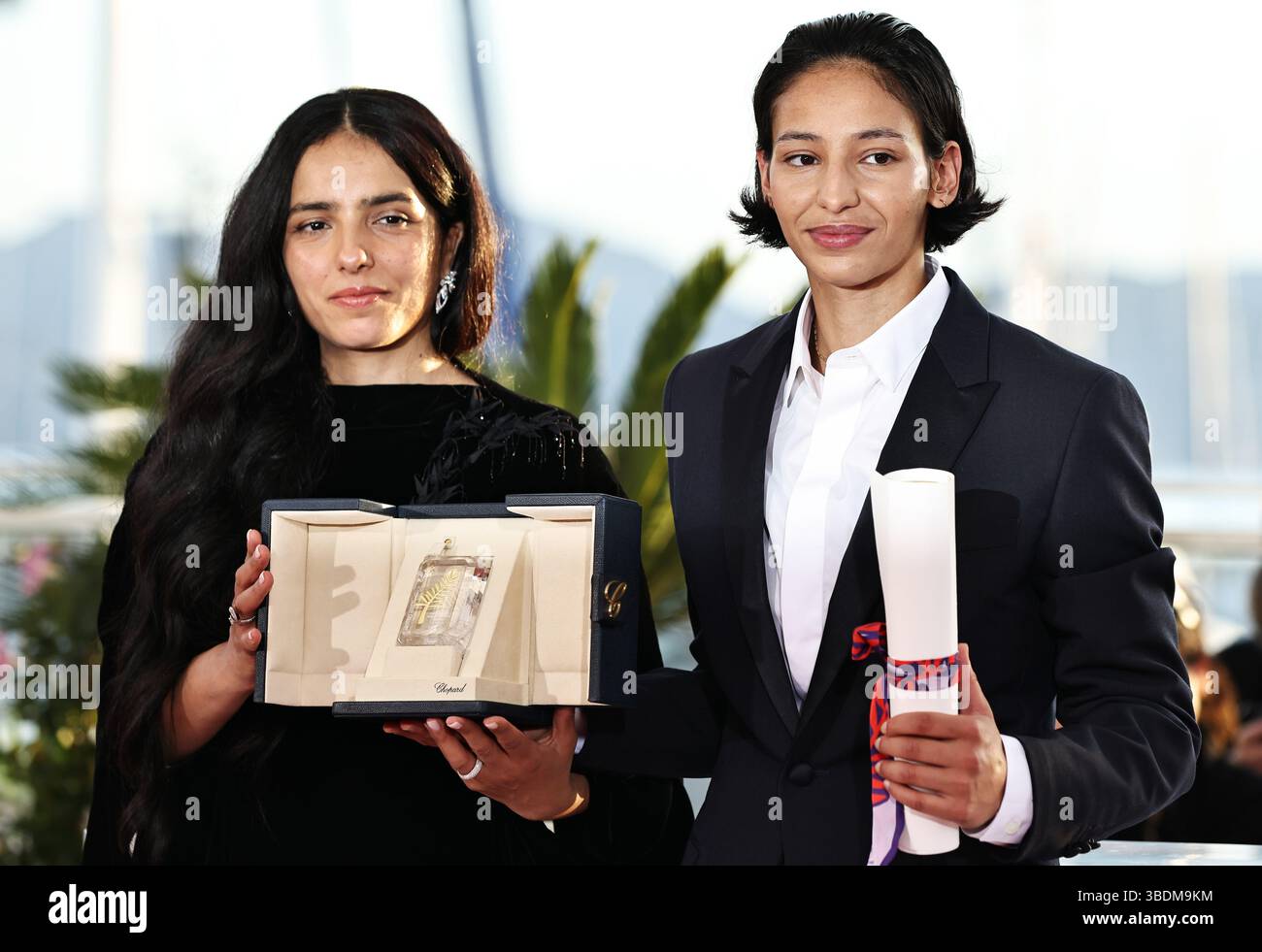 Cannes, France. 24th May, 2025. French actress Nadia Melliti (R) and ...
