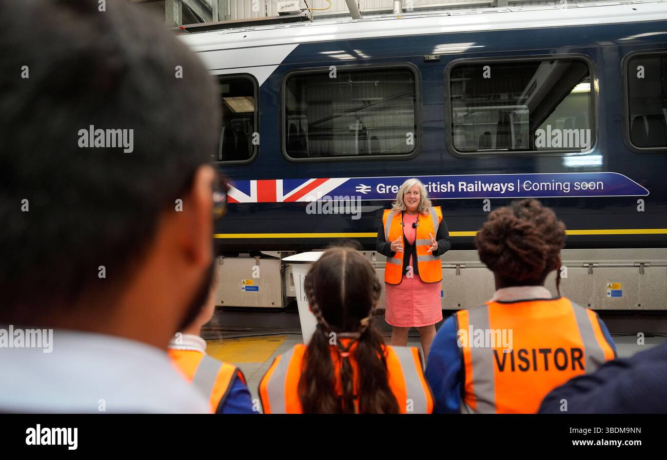 Transport Secretary Heidi Alexander makes a speech in front of a train ...