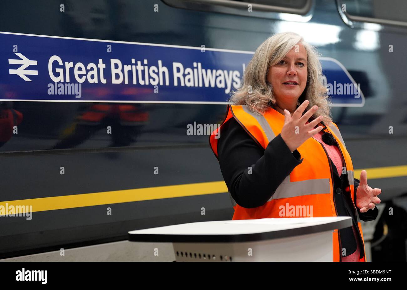 Transport Secretary Heidi Alexander makes a speech in front of a train ...