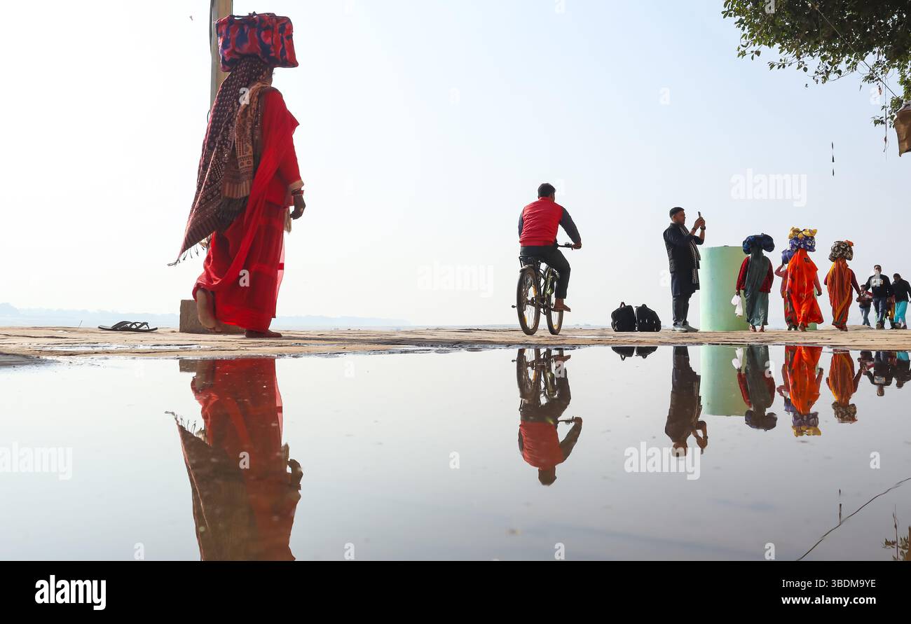 India, Uttar Pradesh, Varanasi, People Walking on the Ghats of Varanasi ...