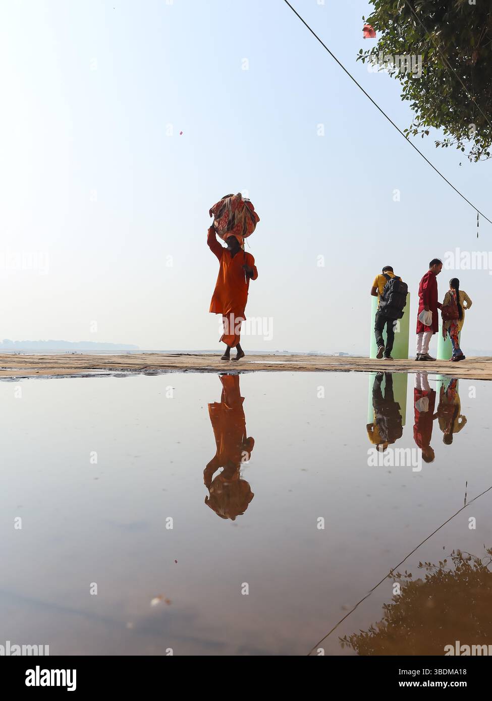 India, Uttar Pradesh, Varanasi, People Walking on the Ghats of Varanasi ...
