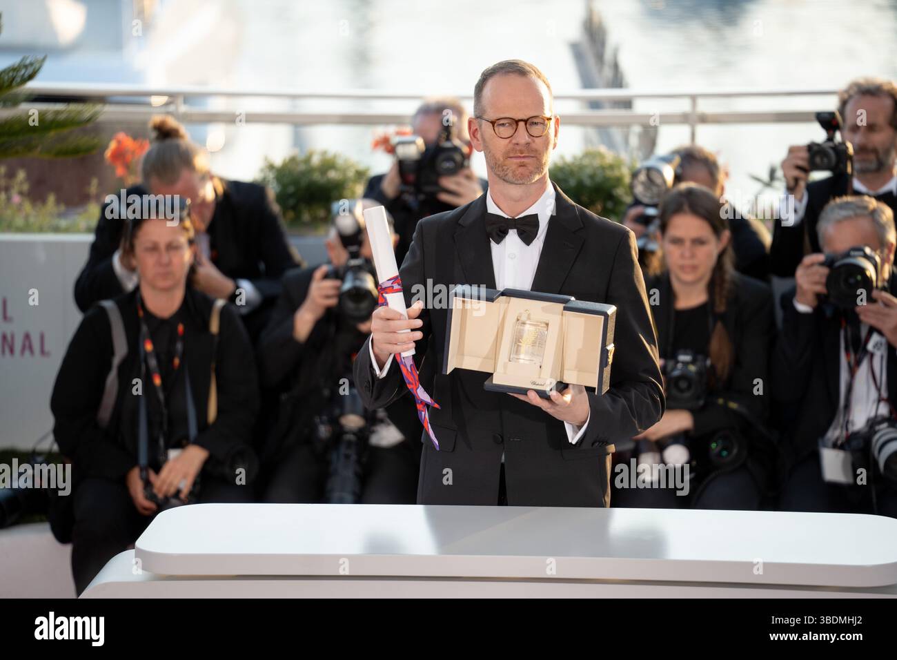 Cannes, France. 24th May, 2025. Joachim Trier poses with the Grand Prix Award for ''Sentimental ...