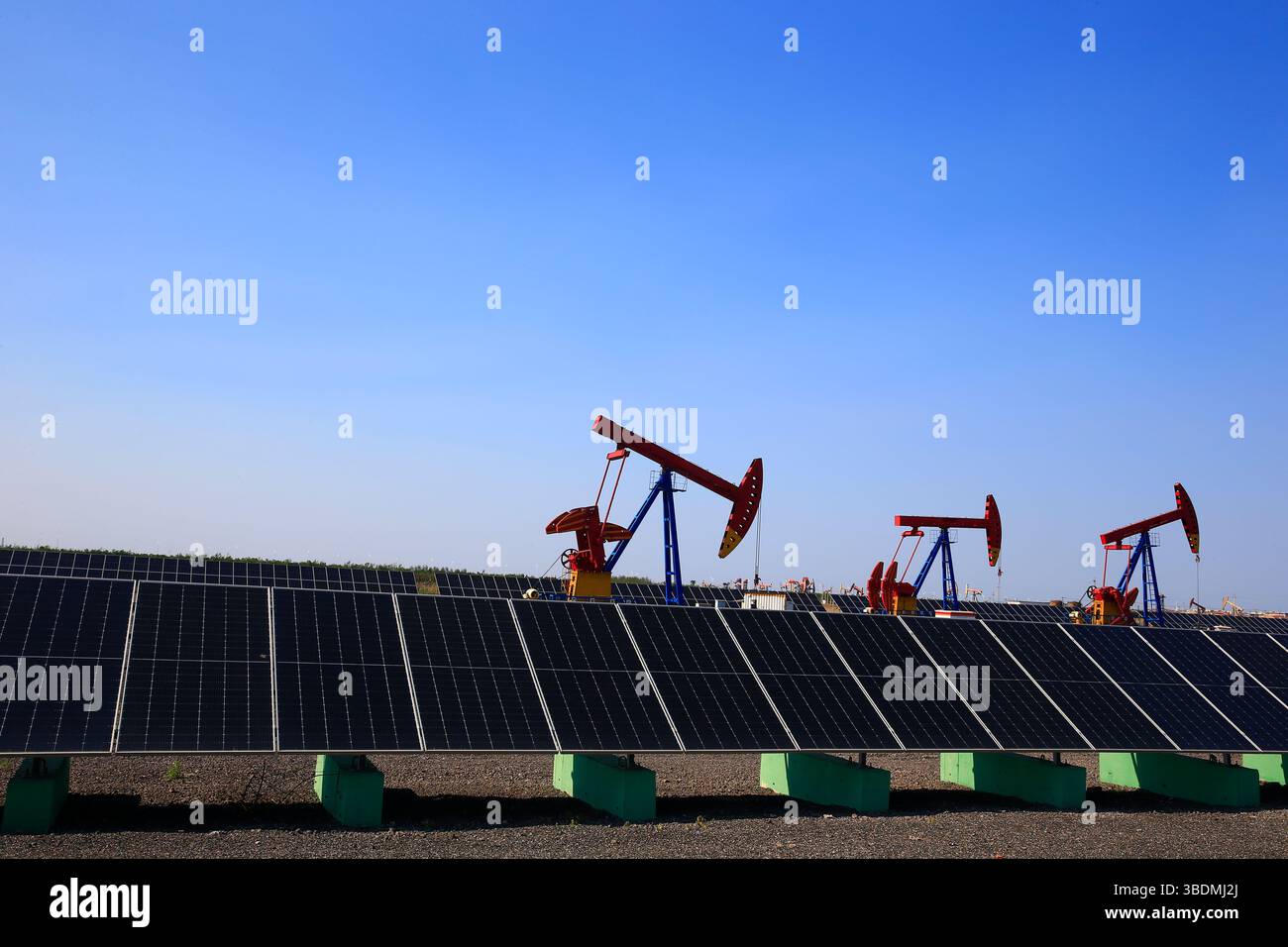 Oil pump, natural gas processing plant, with wind turbine, solar panel ...