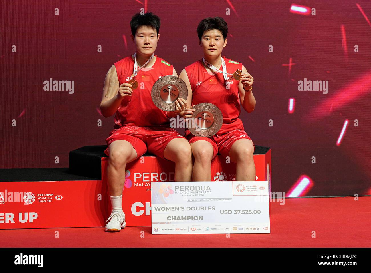 Winners China's Liu Sheng Shu, left, and Tan Ning pose on the podium ...