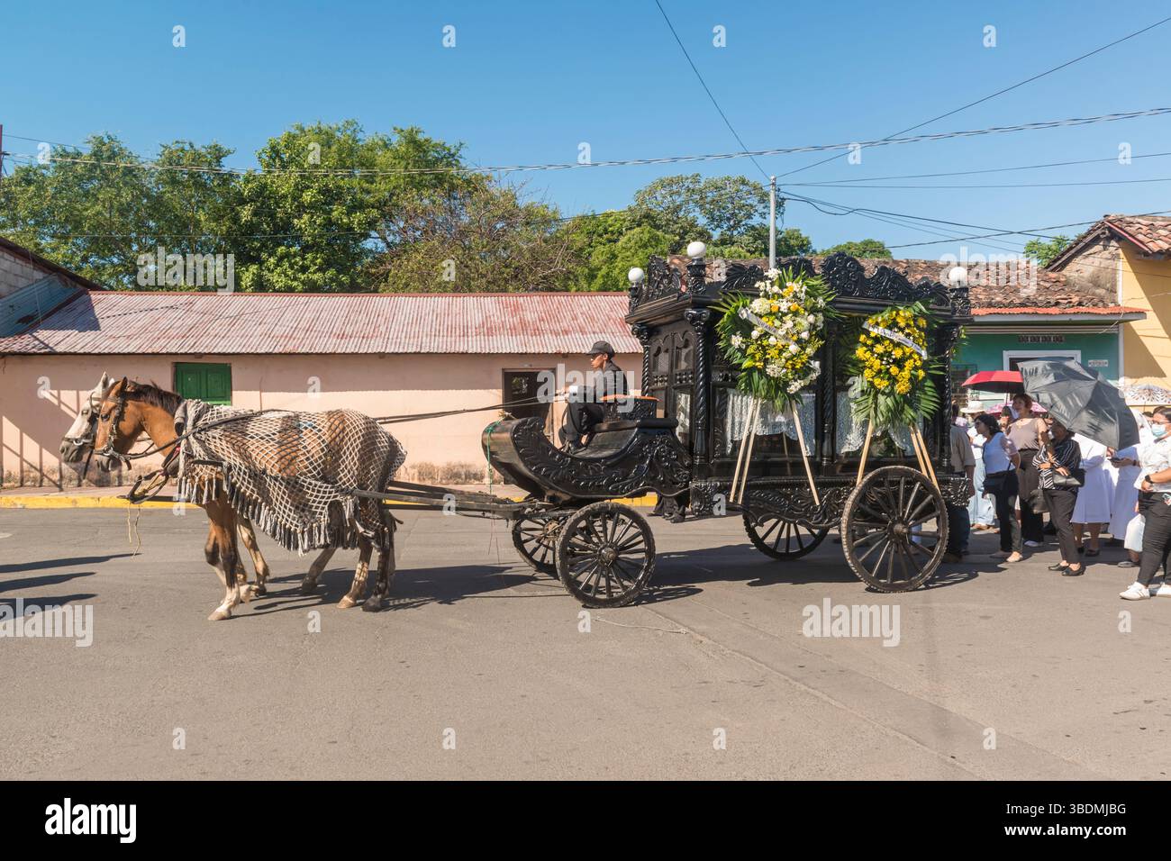 Funeral procession with a horse drawn hearse in Granada, Nicaragua ...