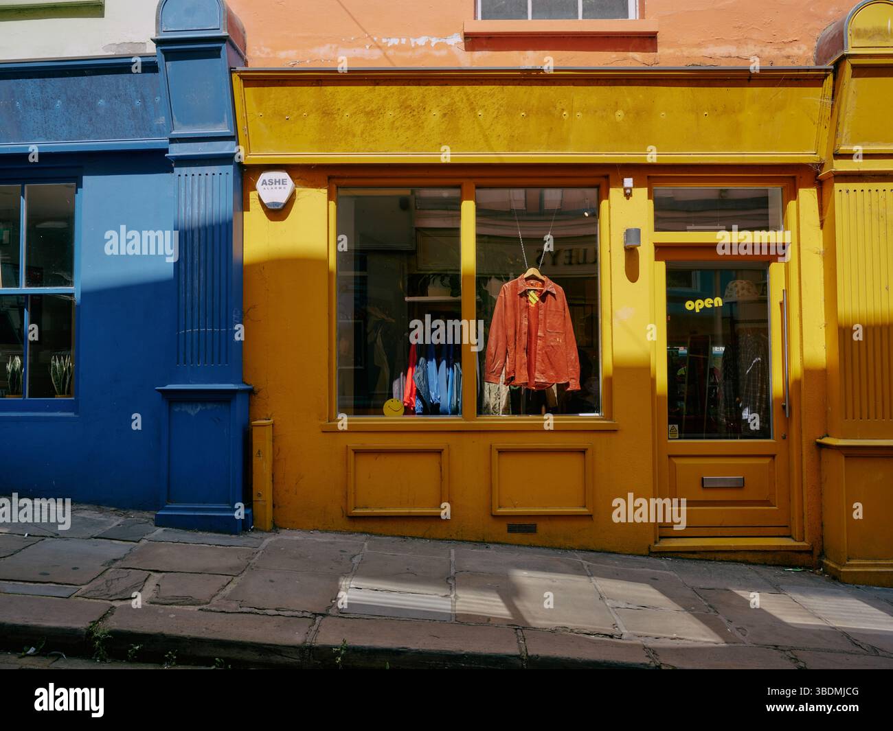 Vintage clothes shop with leather jacket in window - The colourful ...