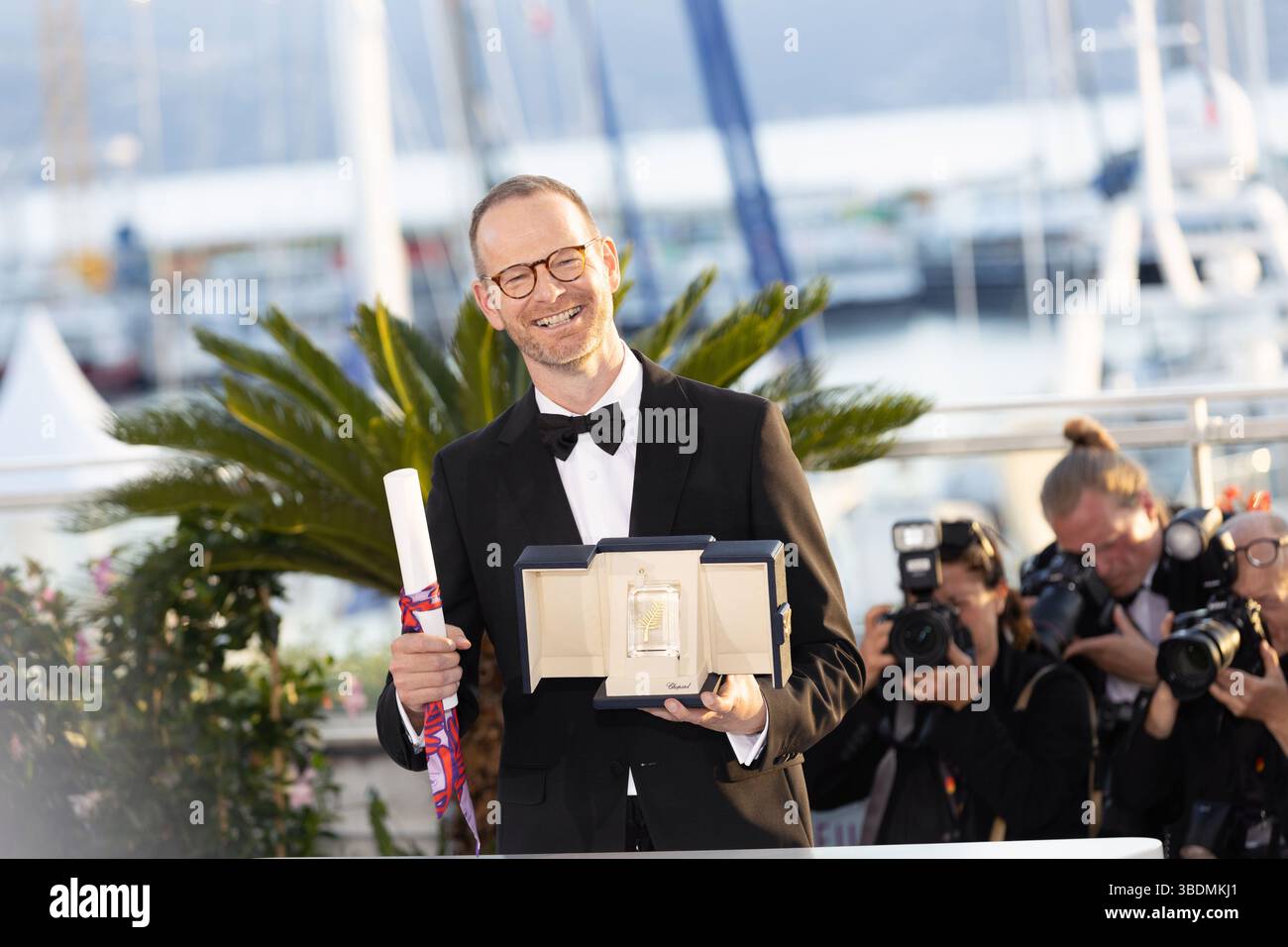 Cannes, France. 24th May, 2025. CANNES, FRANCE - MAY 24: Joachim Trier poses with the Grand Prix ...