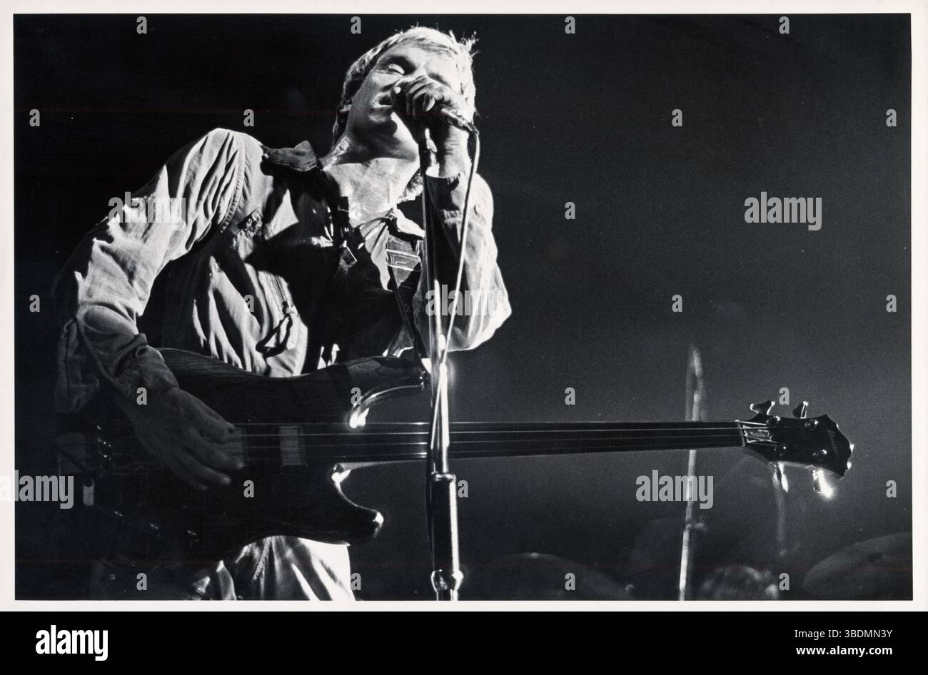 Rock group The Police, singer and bassist Sting, playing live. Leeds ...