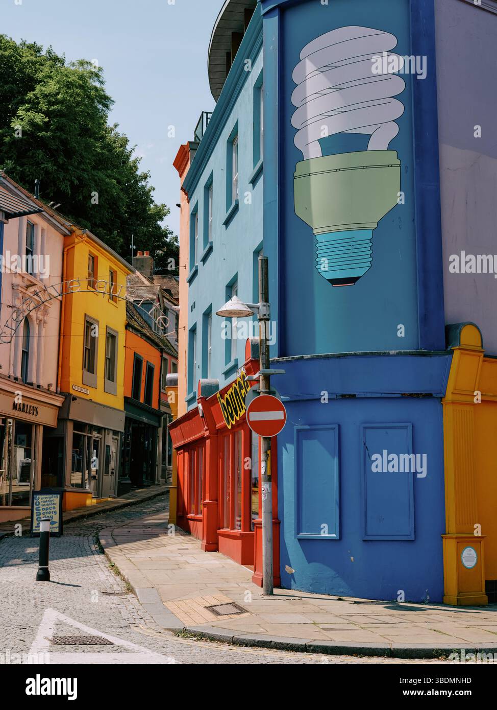 The colourful streets and shop buildings of old town Folkestone, Kent ...