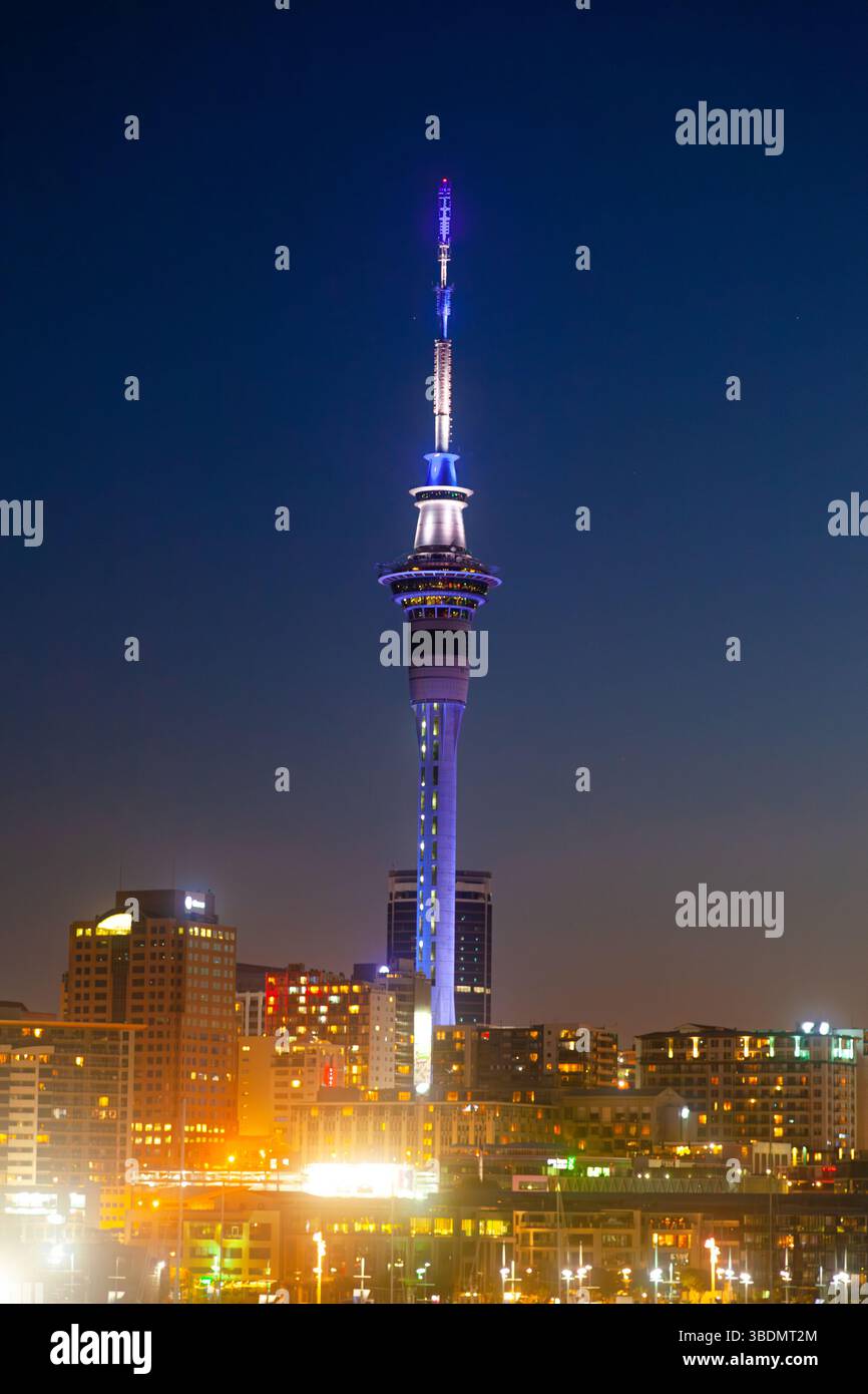 Night city of Auckland New Zealand. Glowing skyscrapers, bay and ...