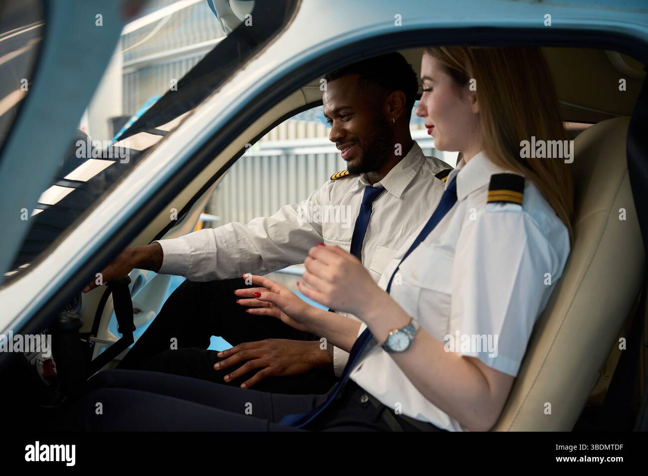 Student pilots training in cockpit of small airplane Stock Photo - Alamy