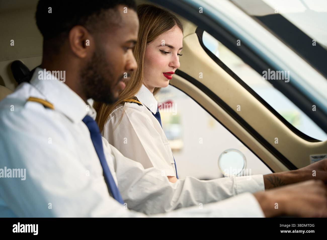 Student pilots training inside cockpit of small airplane Stock Photo ...
