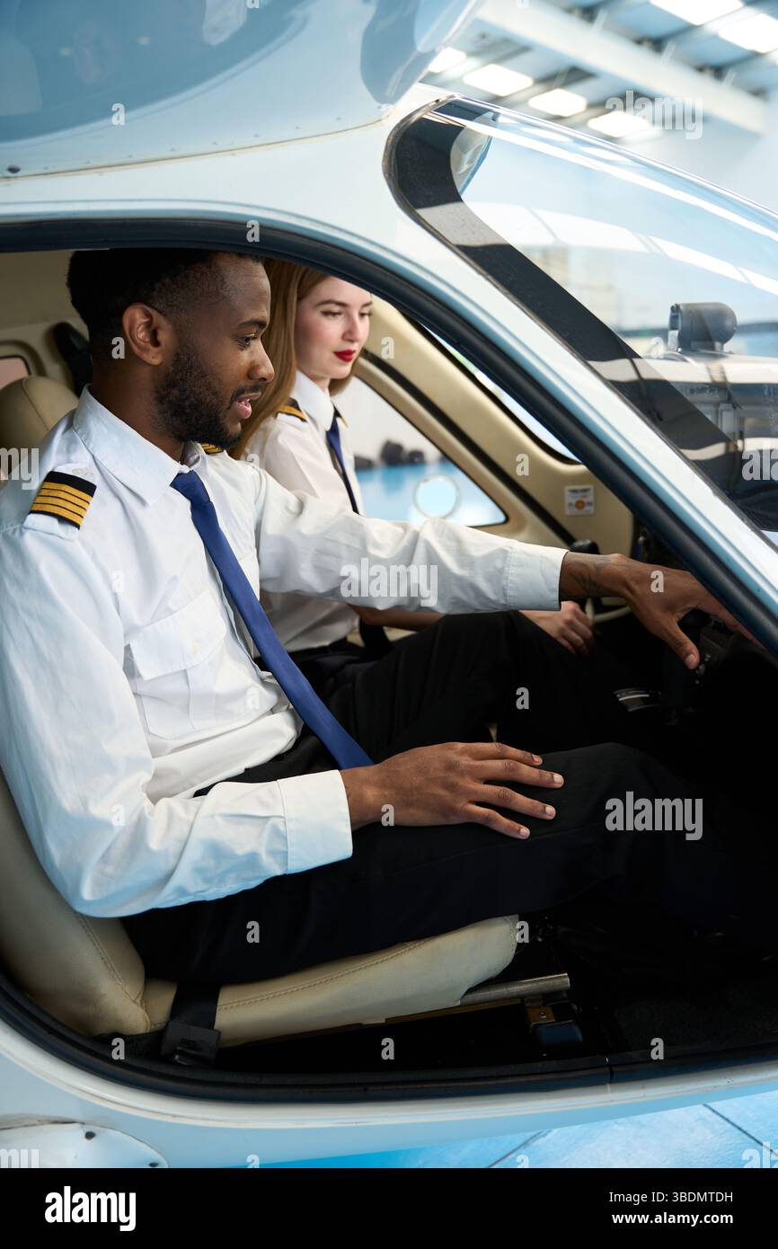 Student pilots training inside aircraft cockpit simulator Stock Photo ...