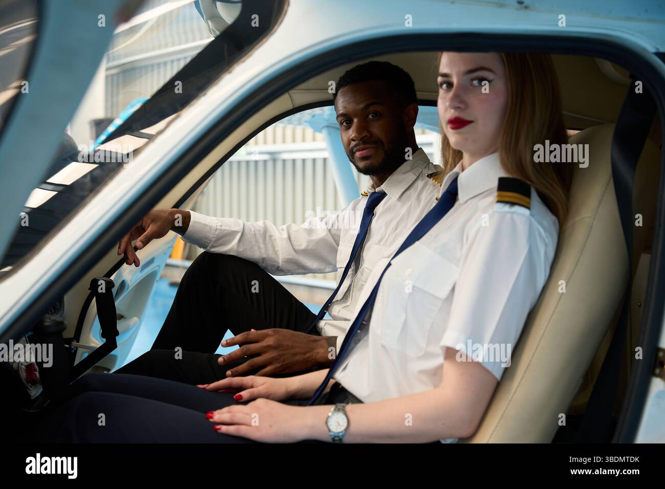 Student pilots training in cockpit of small airplane Stock Photo - Alamy