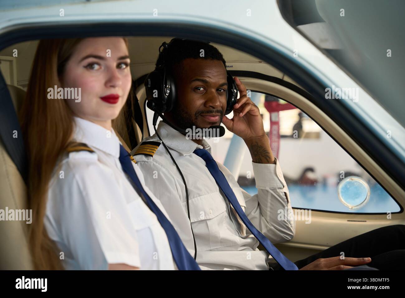 Student pilots training inside aircraft cockpit Stock Photo - Alamy