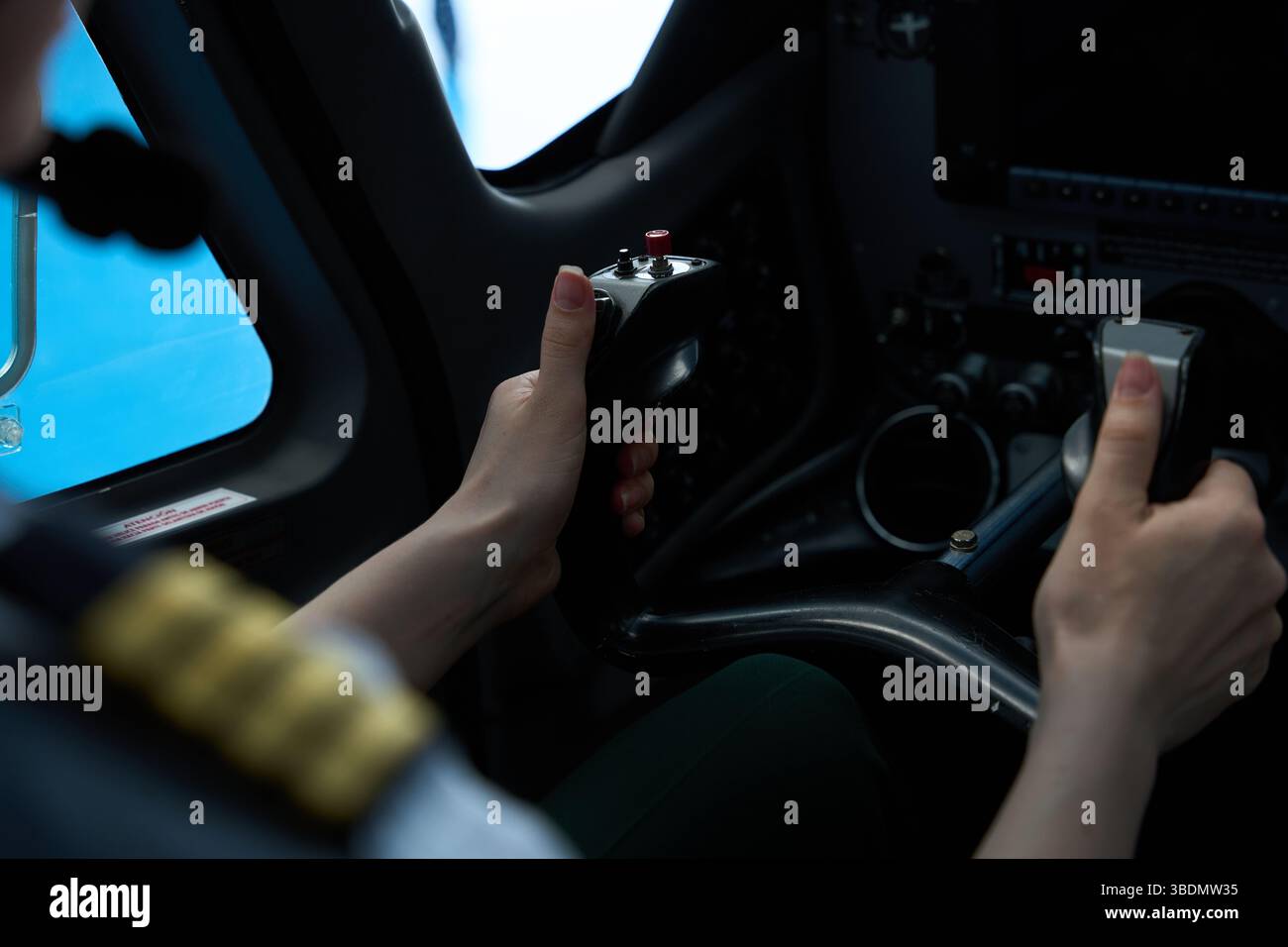 Pilot student operating aircraft controls during flight training Stock ...