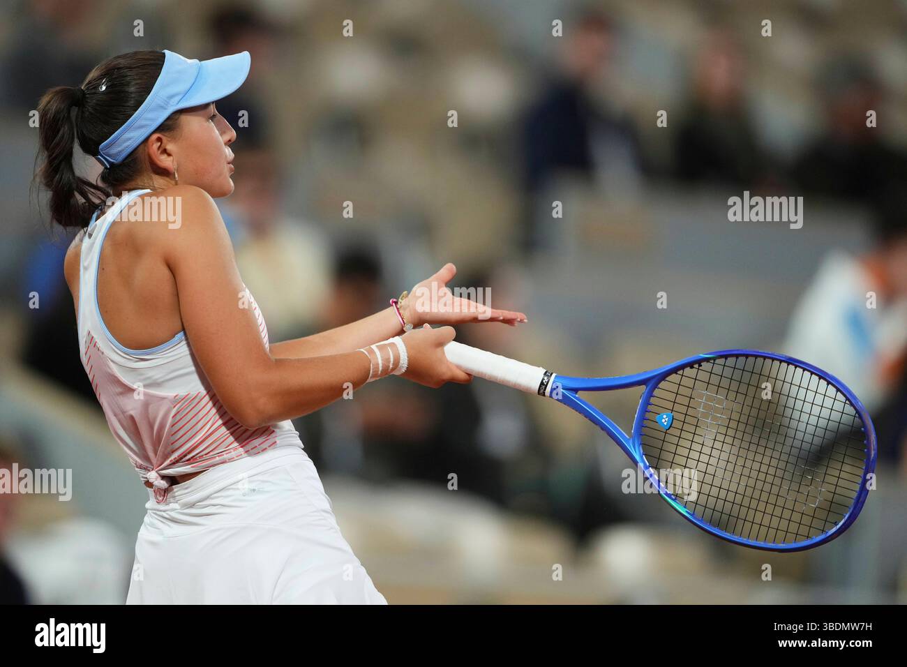 Russia's Kamilla Rakhimova reacts as she plays Aryna Sabalenka of ...