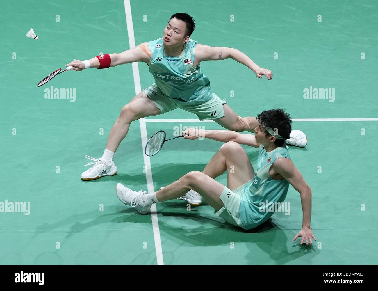Kuala Lumpur, Malaysia. 25th May, 2025. Aaron Chia/Soh Wooi Yik (bottom) compete during the men ...