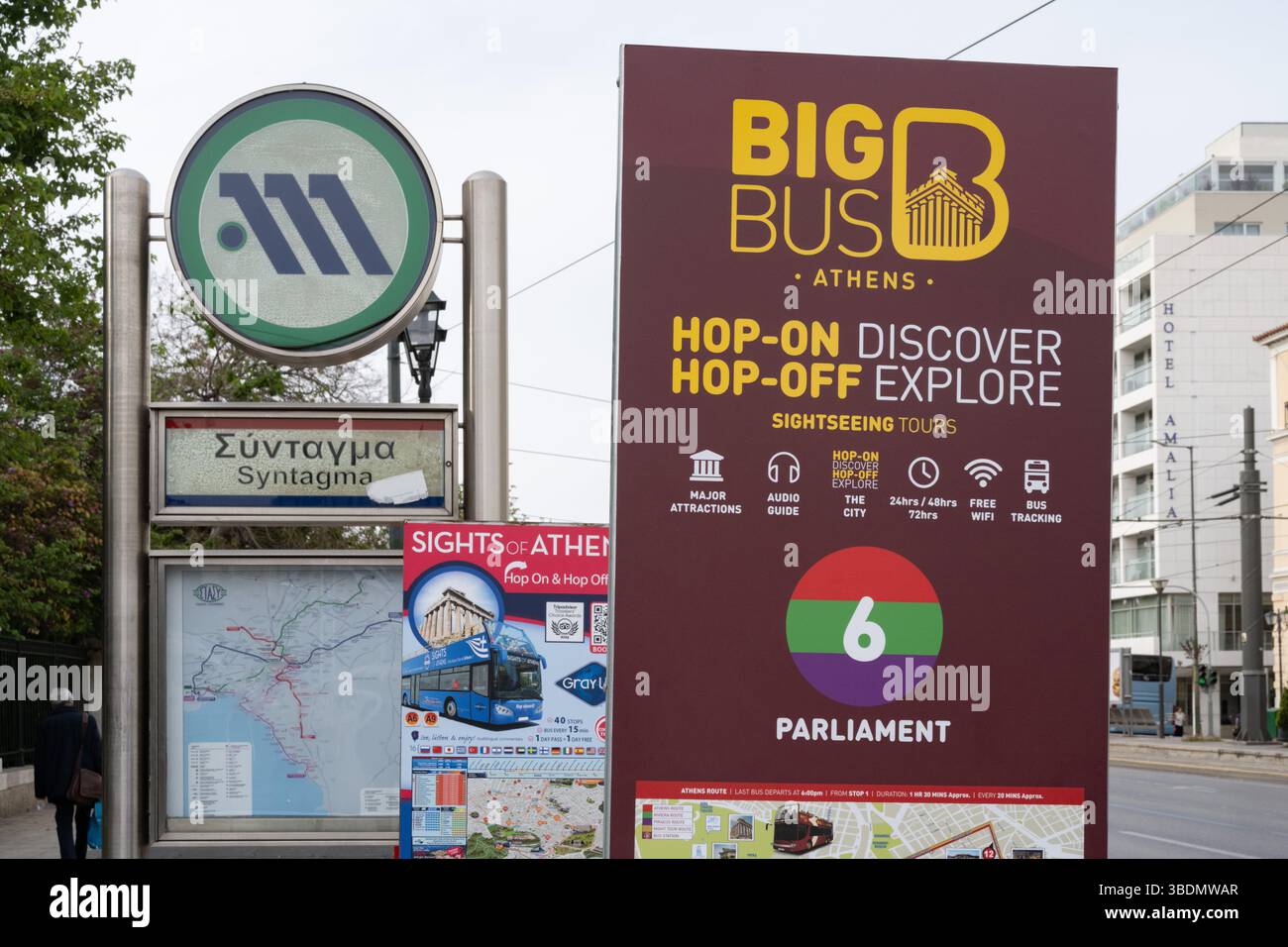 The Big Bus Hop on Hop off discover and explore tourist bus stop beside ...