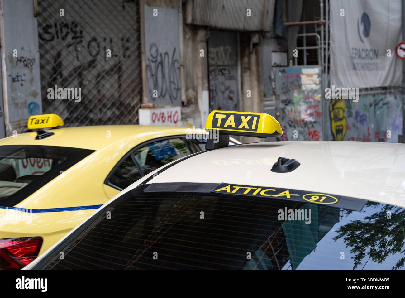 Athens taxi cabs parked in a side street in the central downtown ...