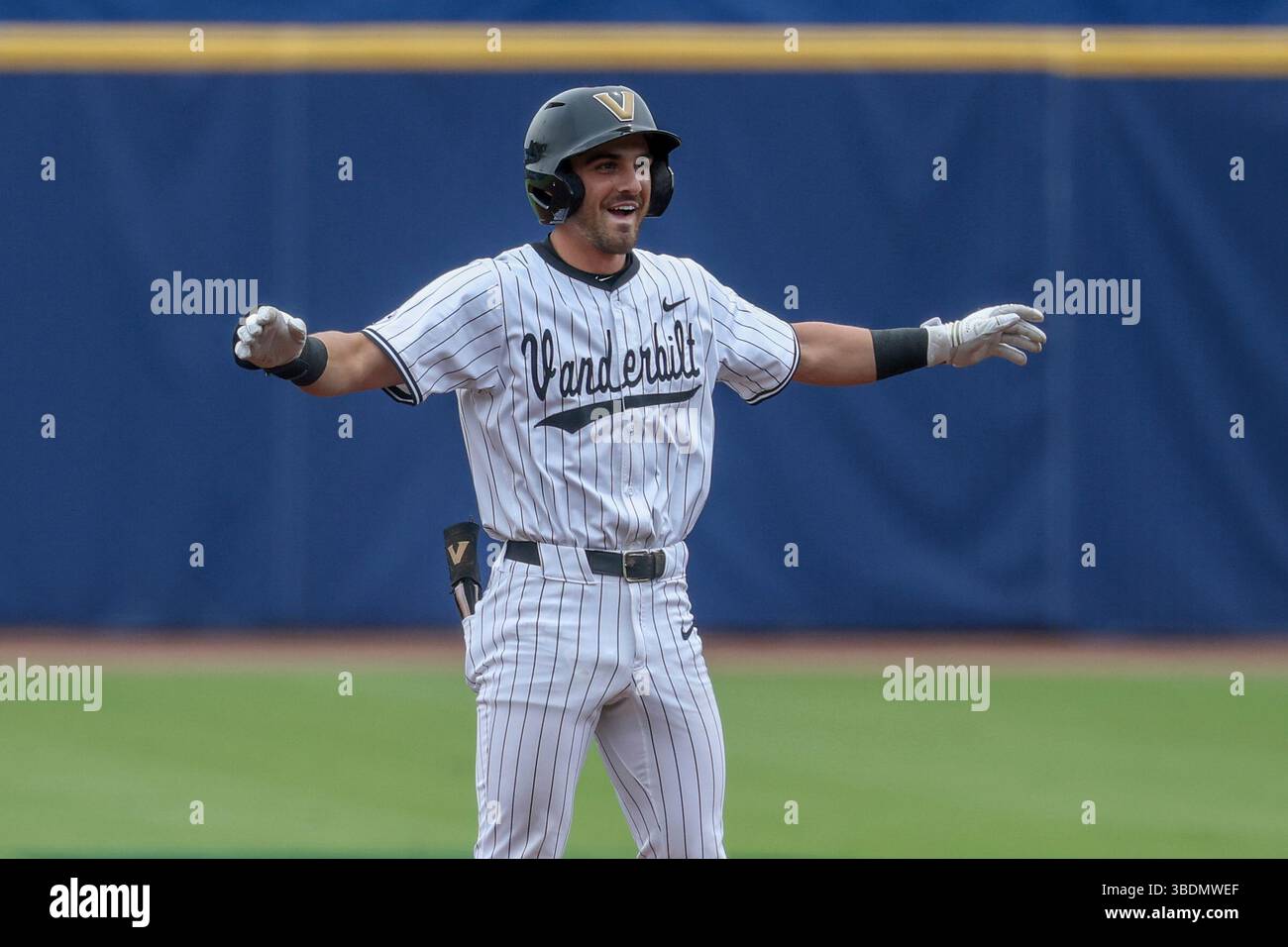 HOOVER, AL - MAY 24: Vanderbilt infielder Mike Mancini (5) holds his ...