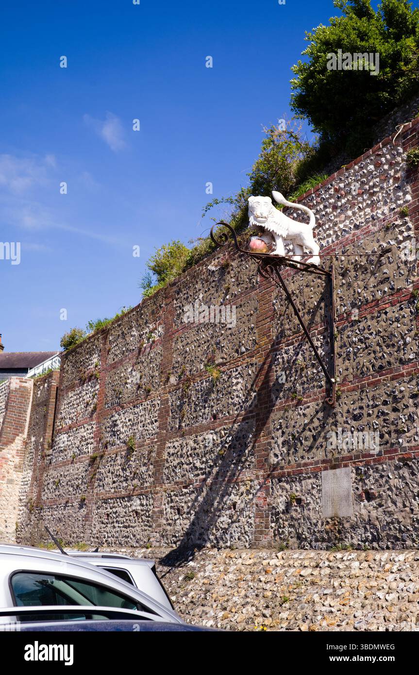 White Lion pub sign on the flint walls at Lewes Stock Photo - Alamy