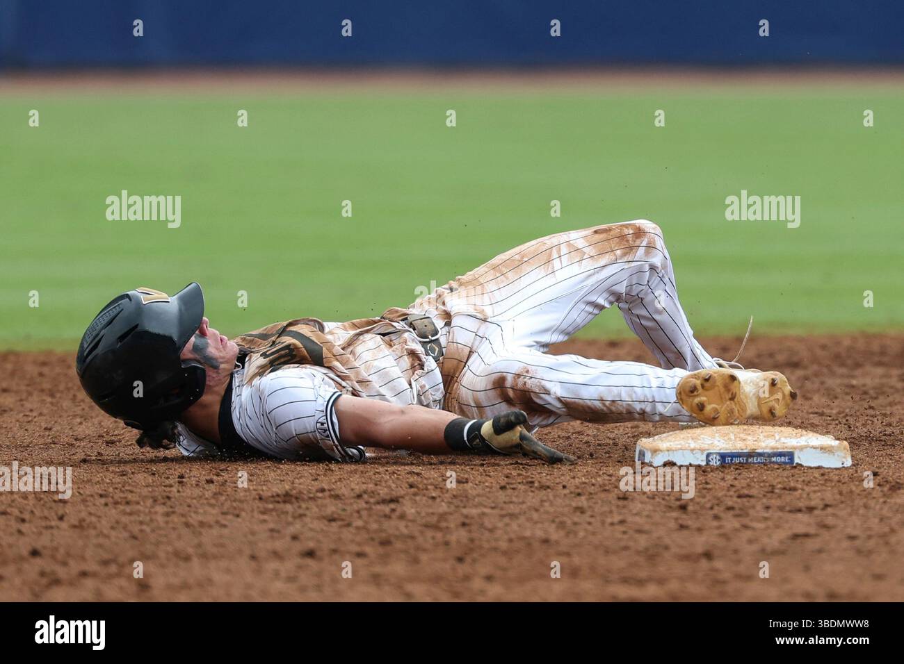 HOOVER, AL - MAY 24: Vanderbilt infielder Rustan Rigdon (19) lays on ...
