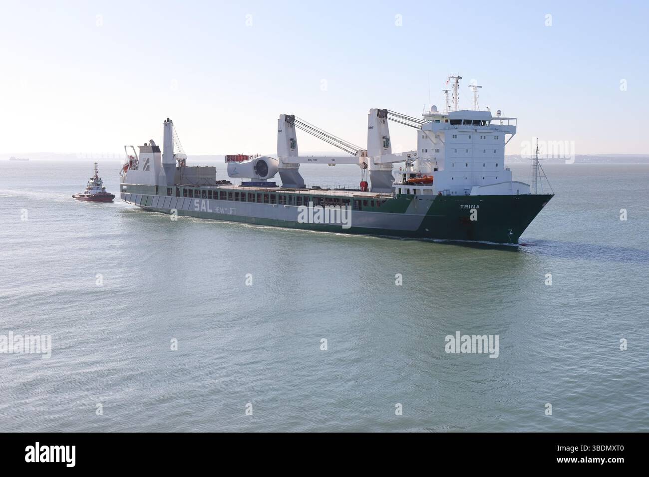 The heavy lift cargo ship MV TRINA about to enter harbour Stock Photo ...