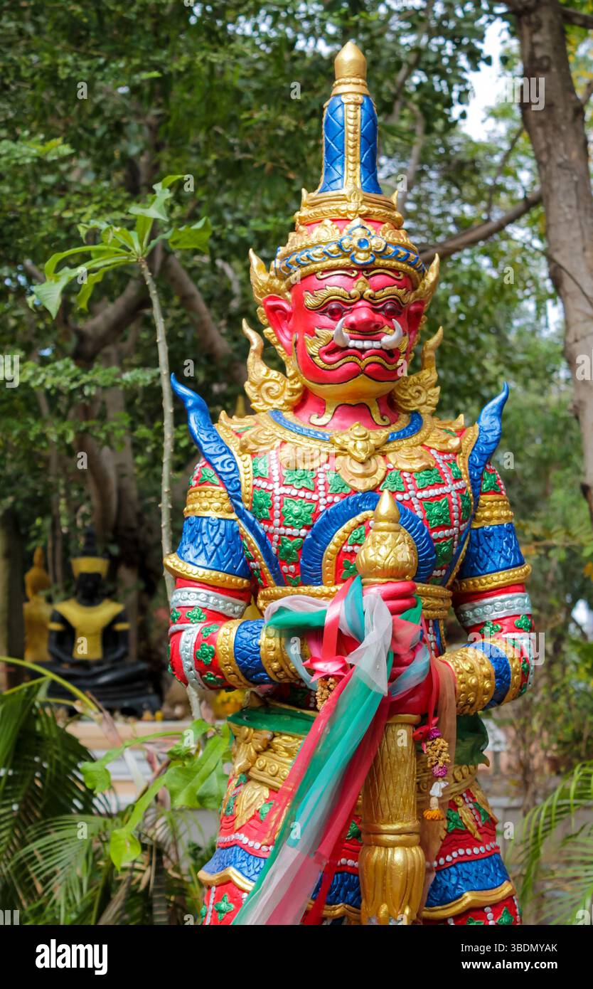 Colorful guard Yaksha statue in a Buddhist temple Wat in Thailand ...